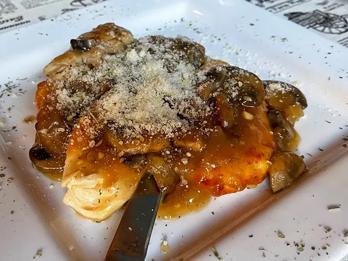 Chicken Marsala: Where poultry meets poetry. This dish is so tender and flavorful, it might just bring a tear to your eye – or is that just the wine sauce? Photo credit: Frances C.