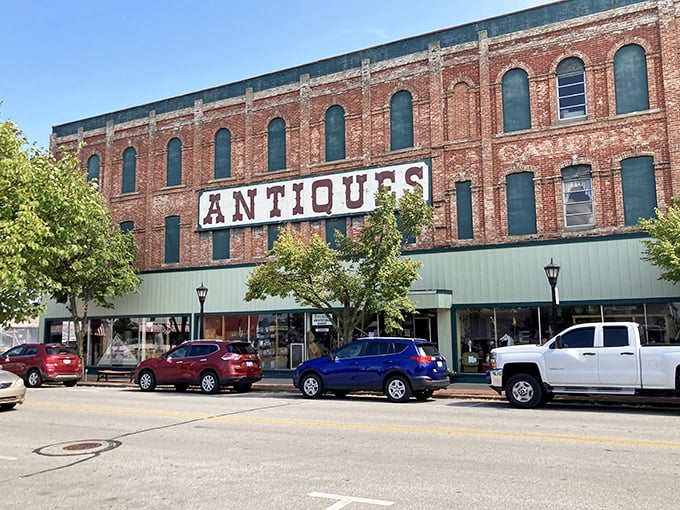 Antiques in a historic building? It's like inception for history buffs! This facade tells stories within stories.