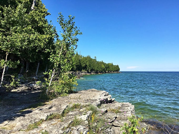 Ancient rocks tell silent stories while clear waters invite adventurers to dip their toes in nature's swimming pool.