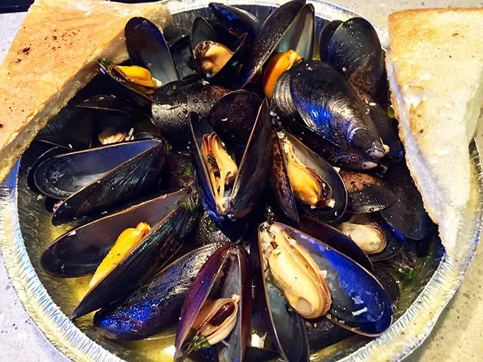 These mussels aren't just fresh – they're having a spa day in white wine and garlic sauce. Pure maritime meditation. Photo credit: Jim Brickett