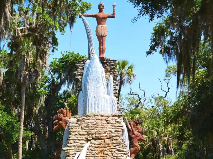 Meet Chief Tomokie, Florida's concrete colossus! He's been raising his cup to the sky since 1957, still waiting for that cosmic refill.
