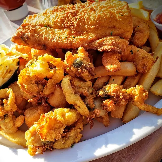 Golden-fried perfection: A seafood platter that makes you wonder if King Midas moonlights as a fry cook. Photo credit: Andrea D'Ambrosio