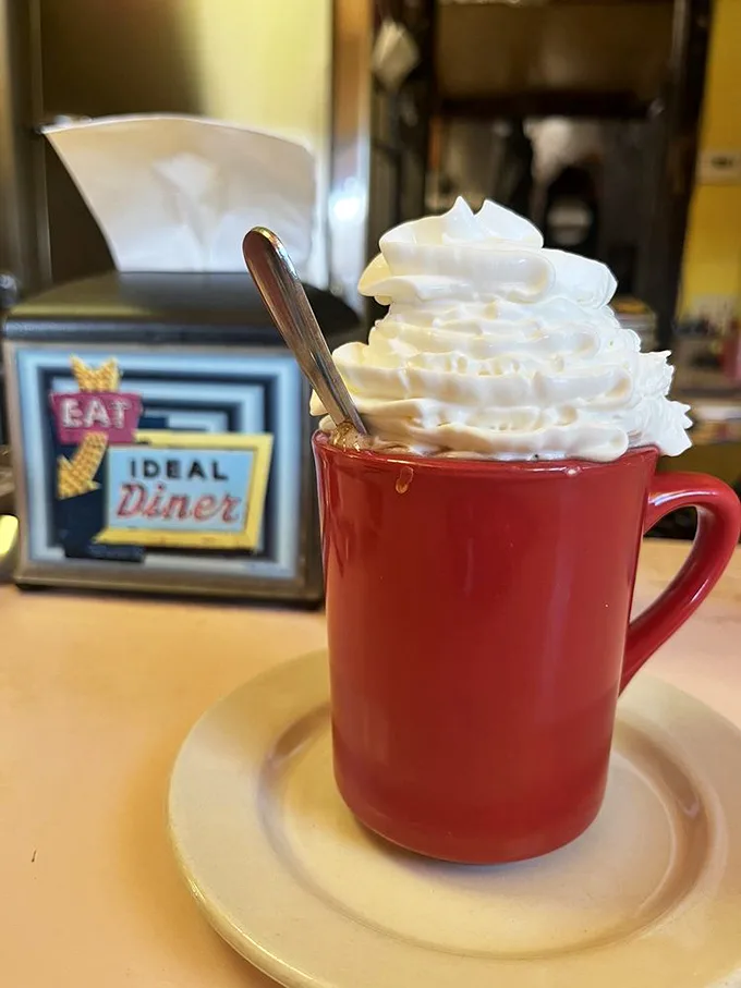 Whipped cream mountain on a coffee sea - this hot chocolate isn't a drink, it's a dessert masquerading as a morning pick-me-up!