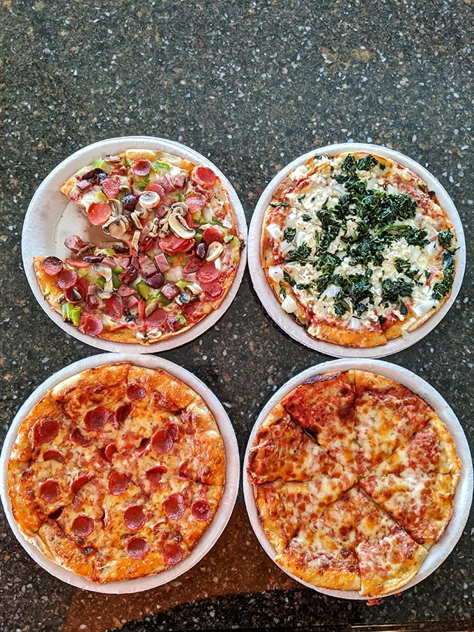 Pizza indecision? No problem! This quartet of pies is like a flavor festival for your taste buds.