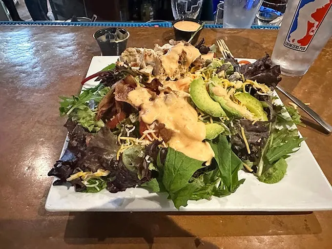 A garden-fresh salad that proves healthy eating doesn't mean sacrificing flavor, topped with creamy house-made dressing. Photo credit: Bradley Stratz
