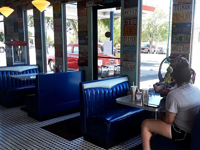 Blue booths and checkered floors – it's like sitting inside a 1950s jukebox. All that's missing is Richie Cunningham sliding in next to you.