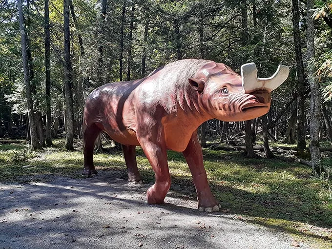 "T-Rex meets Paul Bunyan in this whimsical woodland. Who knew the Mesozoic era could be so... concrete?" Photo credit: Mary Kryza