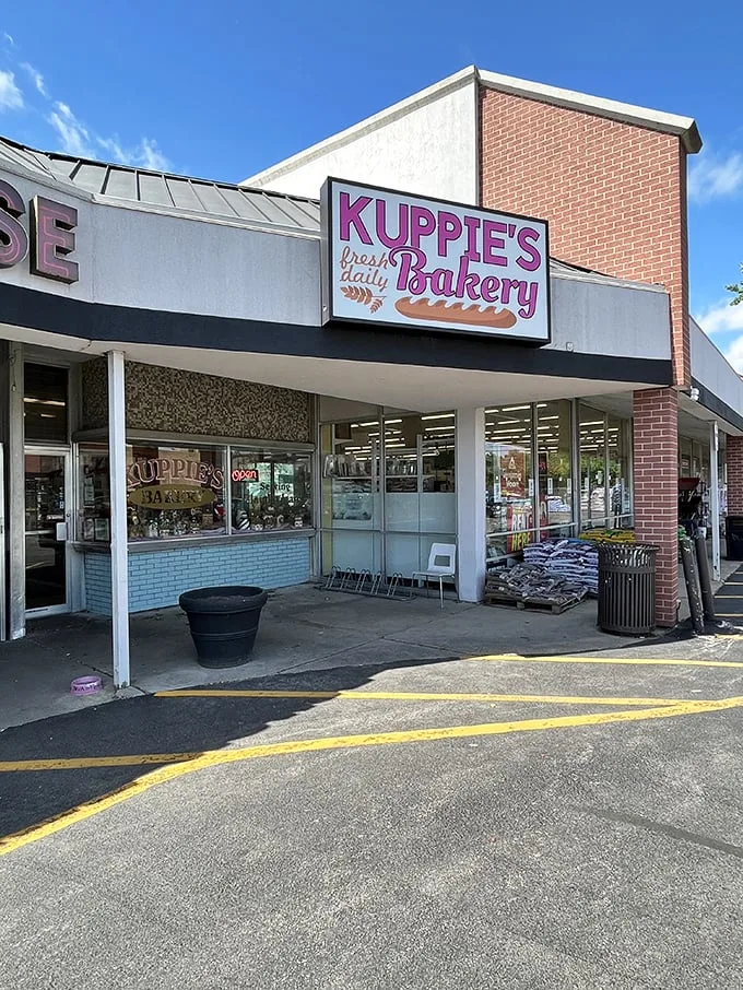 Welcome to donut heaven! Kuppie's Bakery beckons with its cheerful pink sign, promising a sugar-coated adventure that'll make your inner child squeal with delight.