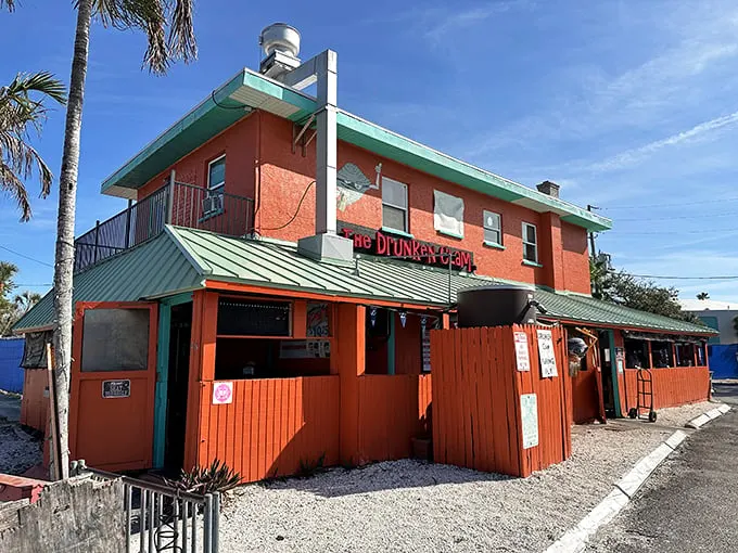 A splash of tropical flair! The Drunken Clam's vibrant exterior is like a Jimmy Buffett song come to life, inviting you to kick back and relax.