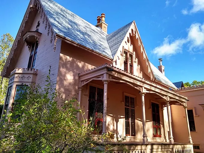 Pink isn't just for Barbie's dreamhouse! This Gothic Revival mansion proves even historic homes can rock a bold hue with style.