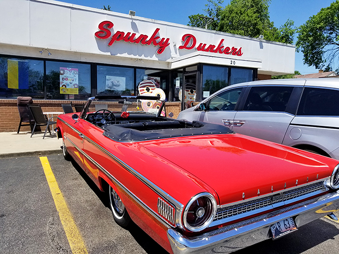 Welcome to donut paradise! Spunky Dunkers' retro sign beckons like a sugary siren, promising sweet delights that would make even Homer Simpson weak at the knees.
