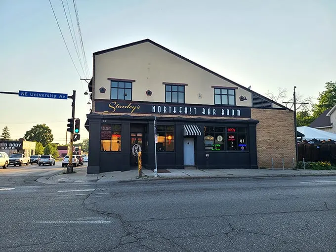 Welcome to flavor town! Stanley's exterior beckons like a yellow brick road leading to culinary oz, complete with a charming awning and blooming flower pots.