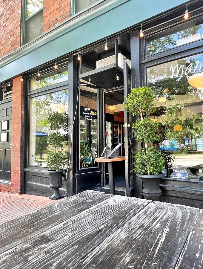Welcome to Misery Loves Co., where the only thing gloomy is the name! This charming storefront promises a culinary adventure that'll turn your frown upside down.