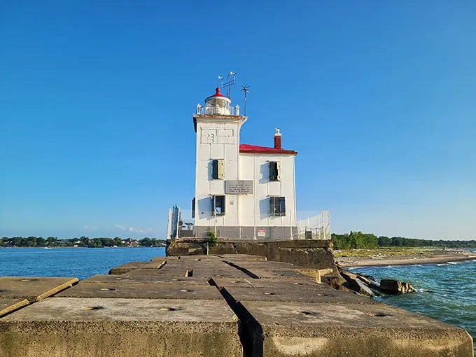 "Ahoy, lighthouse lovers! This 42-foot beacon of beauty stands tall, guarding Lake Erie like a maritime superhero in a crisp white cape."