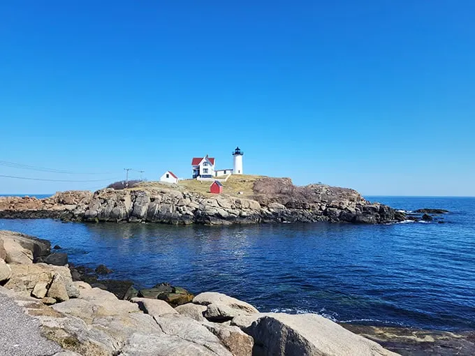 A postcard come to life! Nubble Light stands proud on its rocky perch, like Maine's very own maritime supermodel striking a pose for eternity.