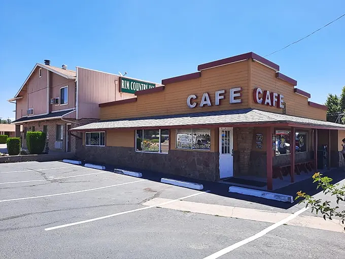 "Welcome to flavor town!" This sun-drenched diner facade promises comfort food and small-town charm, with a heartwarming nod to local heroes.