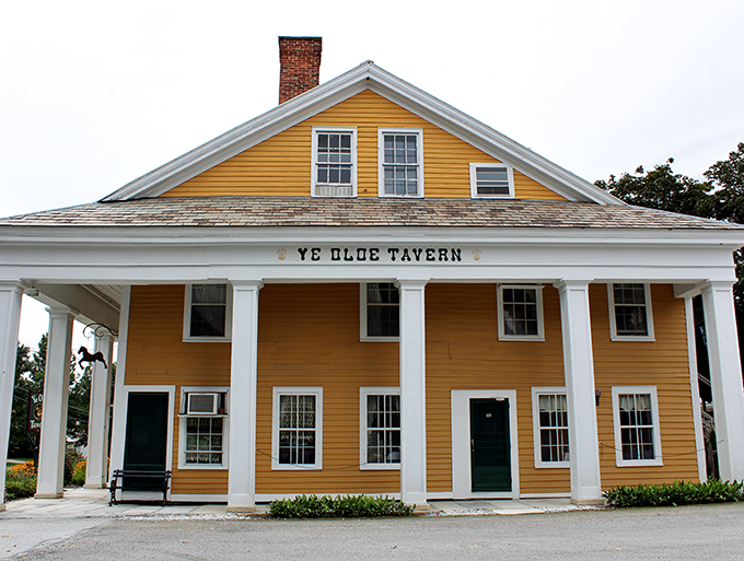A colonial time capsule with wheels! This charming yellow exterior might just transport you back to the 1700s—no DeLorean required.