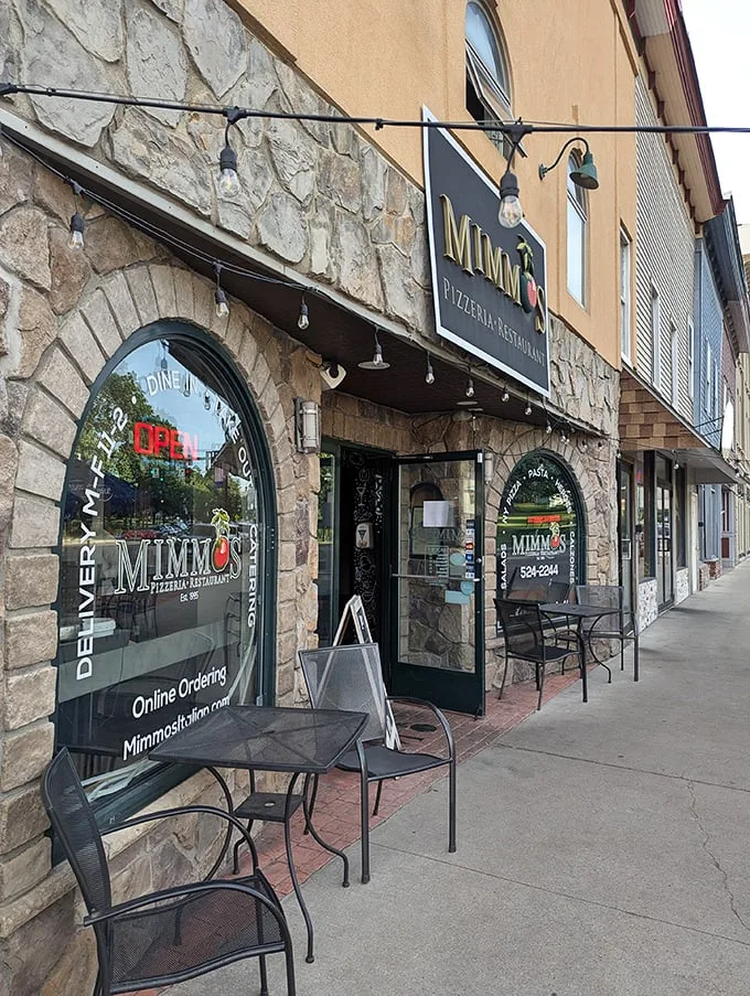 "Welcome to carb heaven!" Mimmo's charming exterior beckons with the promise of Italian delights, its stone facade a prelude to the culinary adventure within.