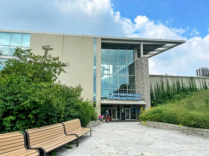 A modern oasis of nature beckons! The Peggy Notebaert Nature Museum's sleek exterior blends seamlessly with its lush surroundings, promising a wild adventure in the heart of the city.