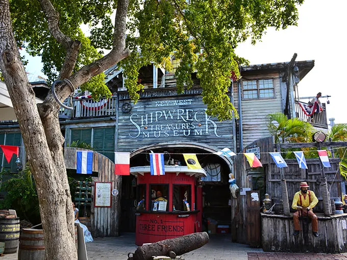 Ahoy, matey! This towering wooden structure isn't a misplaced treehouse – it's the Key West Shipwreck Museum, where history and adventure collide like two ships in the night.