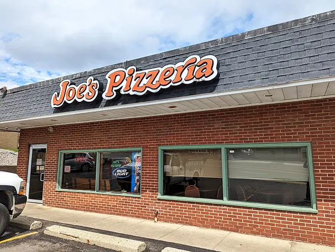 Welcome to pizza paradise! Joe's Pizzeria's retro sign promises a slice of nostalgia and a whole lot of cheesy goodness.
