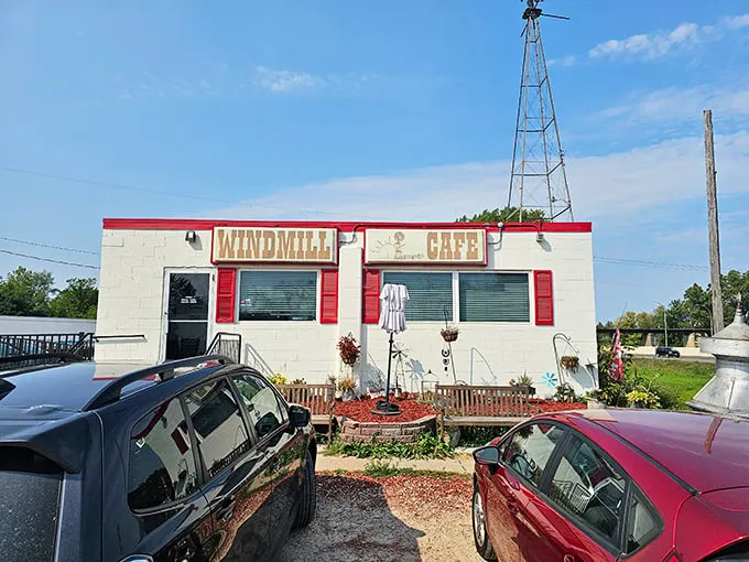 Welcome to the Windmill Cafe, where nostalgia meets appetite! This charming exterior promises a journey back to simpler times, complete with comfort food that'll make your taste buds sing.