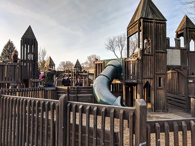 Welcome to the Imagination Station, where childhood dreams come to life in wood and wonder. This playground is like Narnia meets Minecraft – pure magic!
