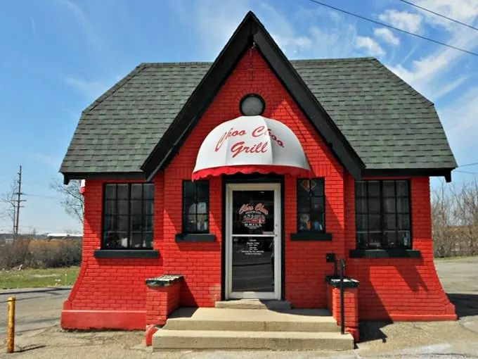 All aboard the flavor express! This cherry-red diner looks like it jumped straight out of a Norman Rockwell painting, promising a journey through time and taste.