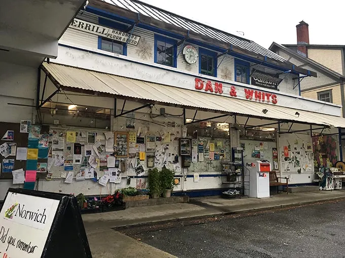 Welcome to Dan & Whit's, where the bulletin board out front is more crowded than a New York subway at rush hour. This isn't just a store; it's a community hub with a side of everything you never knew you needed.