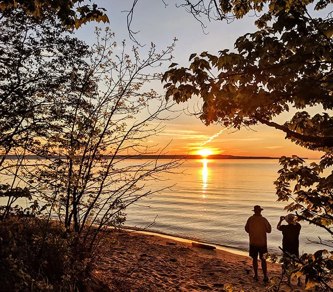 Sunset seekers, unite! This golden hour at Brimley State Park Beach is nature's own Oscar-worthy performance. No acceptance speech needed.
