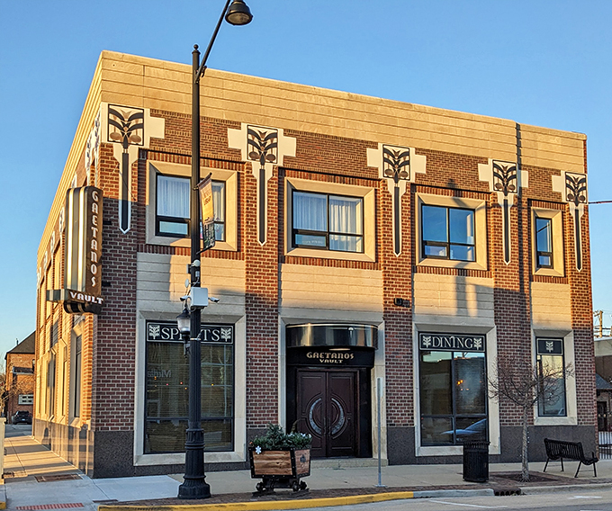 A bank heist for your taste buds! Gaetano's Vault's exterior promises a culinary adventure behind its art deco facade and mysterious "Spirits" and "Dining" windows.