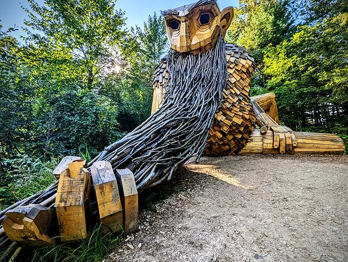 Behold, the bearded behemoth of Germfask! Benny lounges by the river, his wooden whiskers ready to tickle the imagination of every passerby.