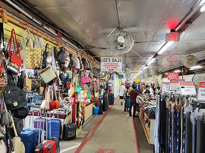 Bag lady heaven! From beachy totes to glitzy clutches, this booth's got more arm candy than a Hollywood red carpet.