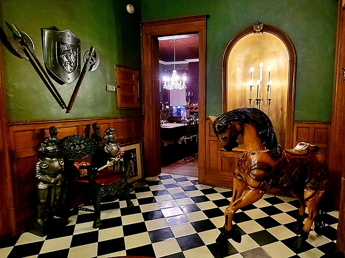 Knights, horses, and checkerboard floors – oh my! This eclectic entryway is like stepping into a medieval fever dream (in the best way).