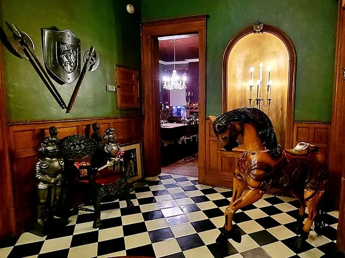 Knights, horses, and checkerboard floors – oh my! This eclectic entryway is like stepping into a medieval fever dream (in the best way).