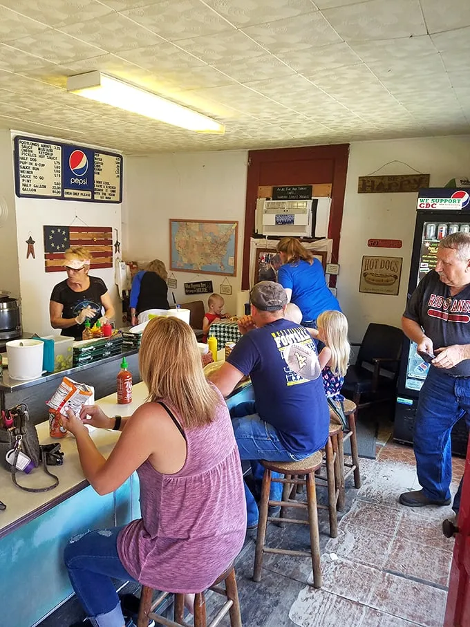 A feast for the senses! Happy diners crowd the counter, proving that good food brings people together.
