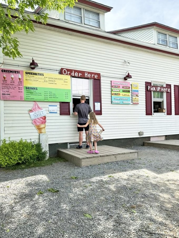 Ice cream social, Vermont style! These happy customers are living their best creemee life on Palmer Lane's inviting porch.