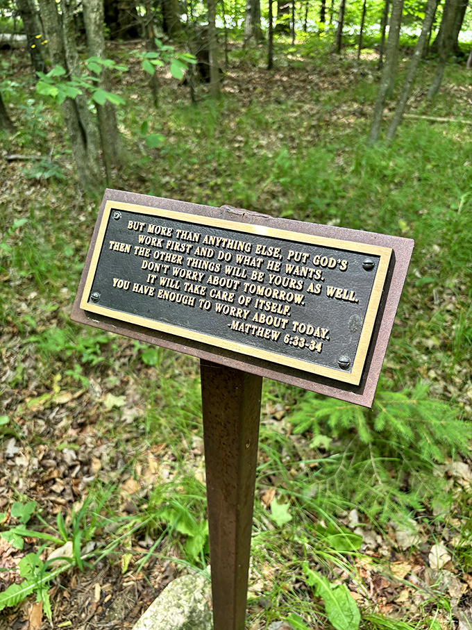 Words of wisdom in the wilderness. This marker reminds us to stop and smell the pine needles once in a while.