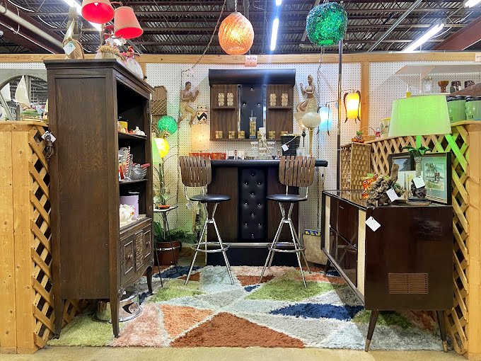 Retro relaxation station! This vintage bar setup is ready to transport you to a swinging '60s cocktail party. Martinis not included!