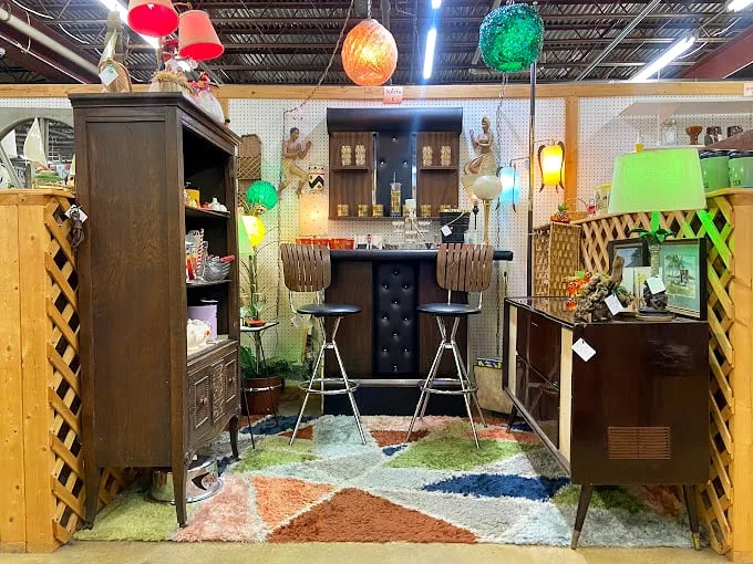 Retro relaxation station! This vintage bar setup is ready to transport you to a swinging '60s cocktail party. Martinis not included!