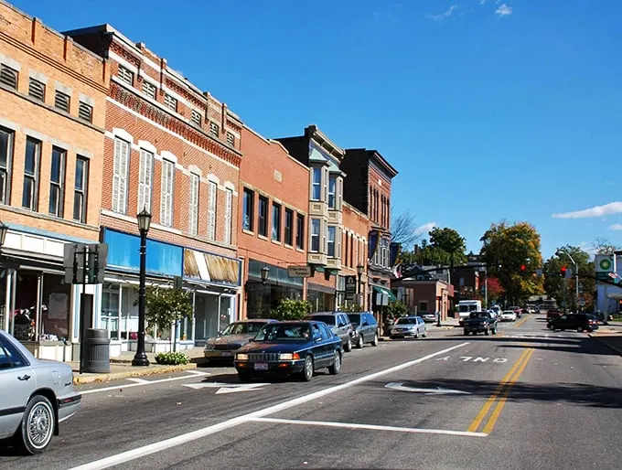 Millersburg's main street: Where Amish country meets small-town charm. Horse-drawn buggies and quaint shops create a unique blend of old and new.