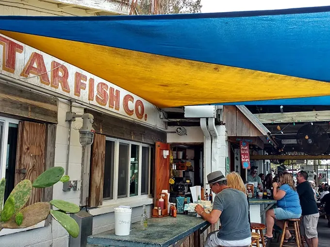Star Fish Co.: Where the blue awning promises shade, but the seafood steals the spotlight. Your taste buds are in for a treat!