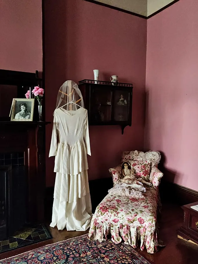 Something old, something new, something borrowed, something… haunted? This vintage dress display is giving me serious "Miss Havisham" vibes.