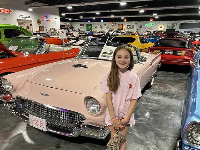 Start 'em young! This little car enthusiast is getting an early education in the finer points of classic American engineering. Future mechanic in the making?