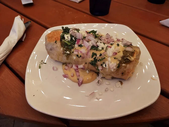 Burrito bliss on a plate! This wrapped wonder is like a warm, edible hug from your abuela – if she were a gourmet chef.