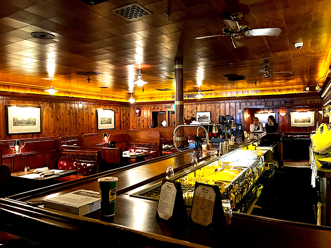 Where everybody knows your name... or soon will! The Pine Club's warm, inviting interior feels like a hug from your favorite aunt – if your aunt served world-class steaks.