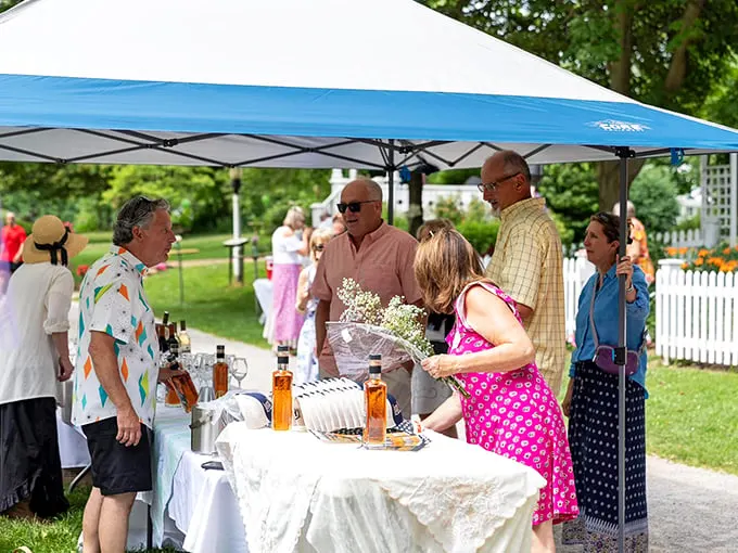 Cheers to history! These dapper folks are toasting the past with present-day panache. It's like "Downton Abbey" meets "Cheers" – where everybody knows your (great-great-grandparent's) name.