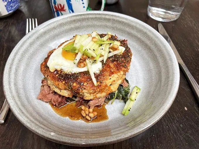 Johnny cake living its best life! This dish is like the cool kid at school – effortlessly stylish and universally adored.