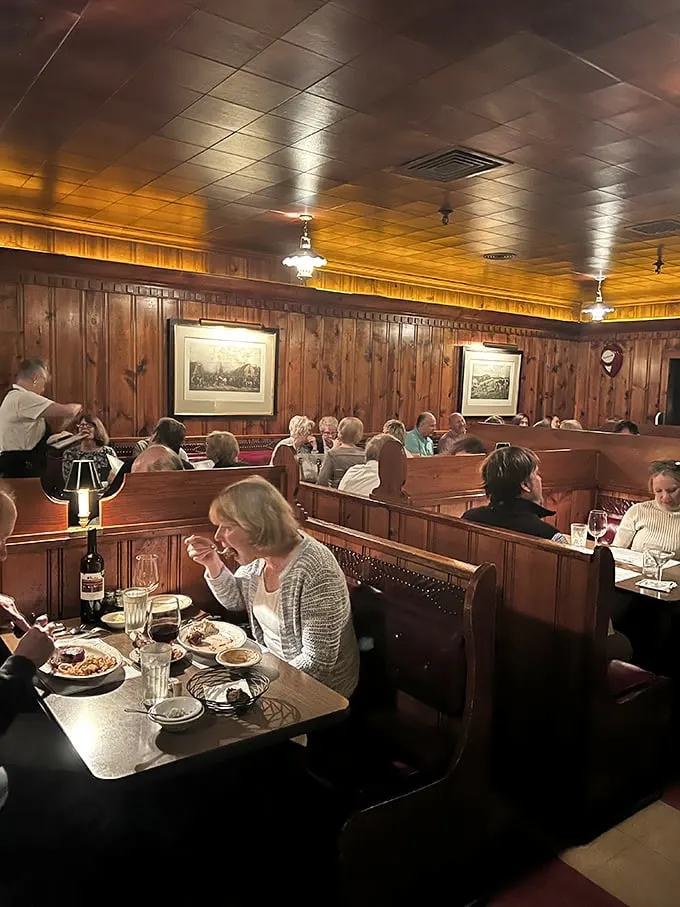 Dinner and a show! The Pine Club's dining room buzzes with energy, laughter, and the occasional "ooh" and "aah" as perfectly cooked steaks make their grand entrance.
