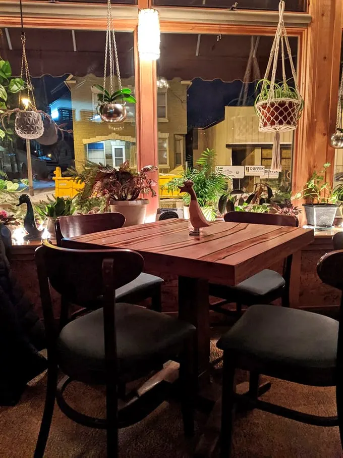 A window seat with a side of greenery. Dine among the plants and pretend you're on a delicious jungle expedition.